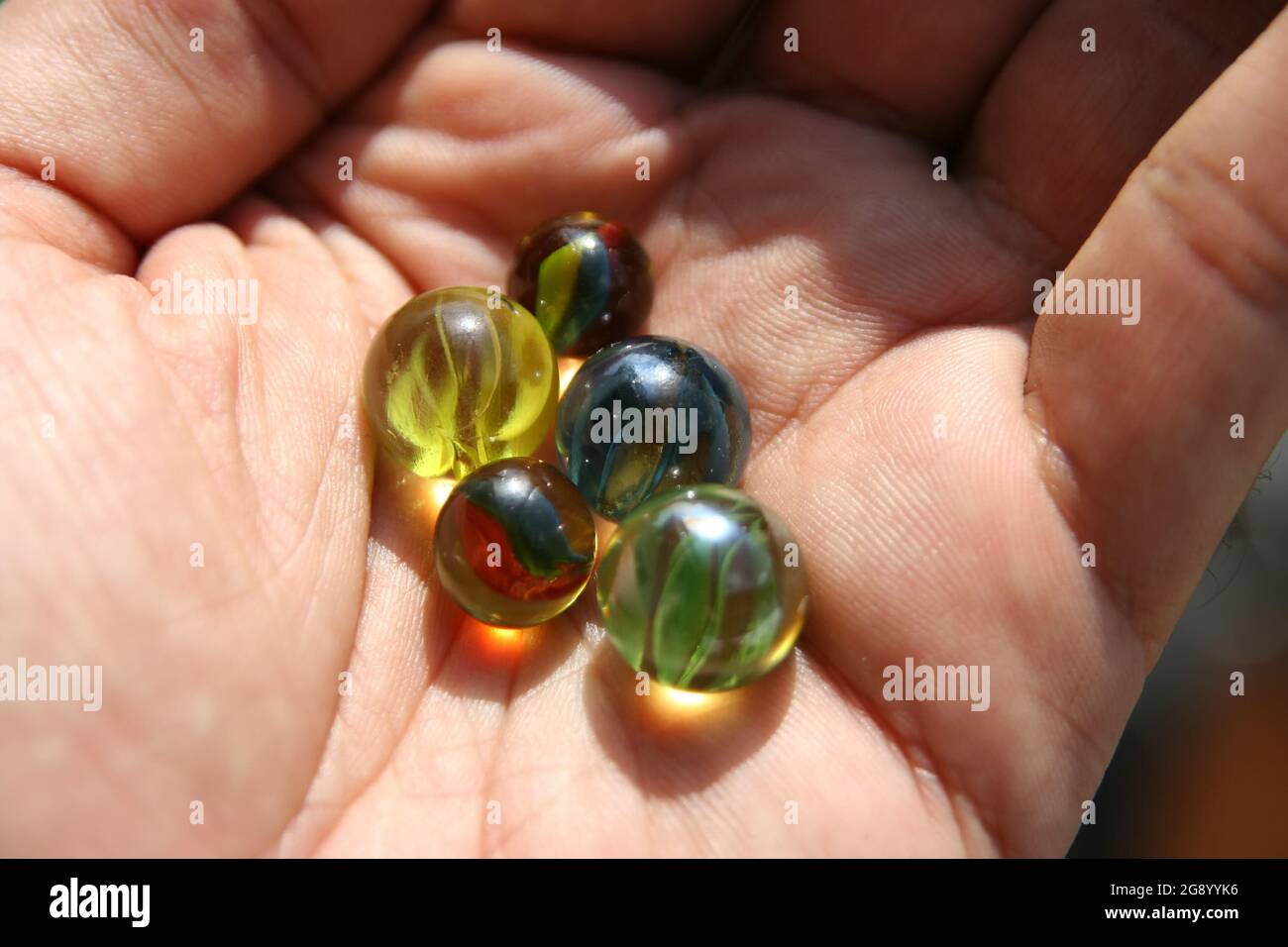 Children playing marbles hi-res stock photography and images - Alamy