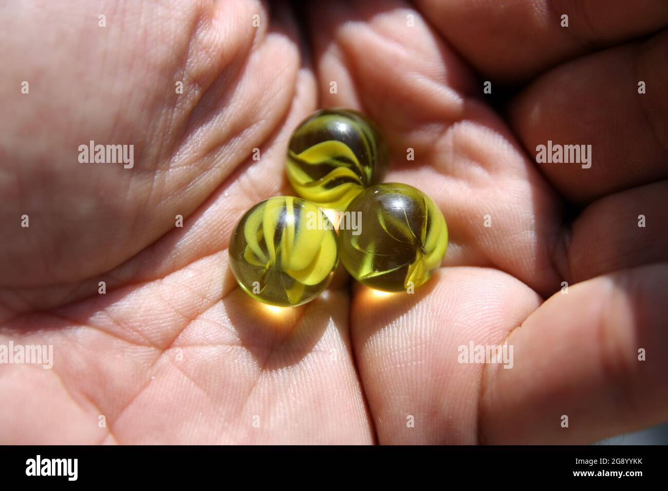 Children playing marble hi-res stock photography and images - Alamy