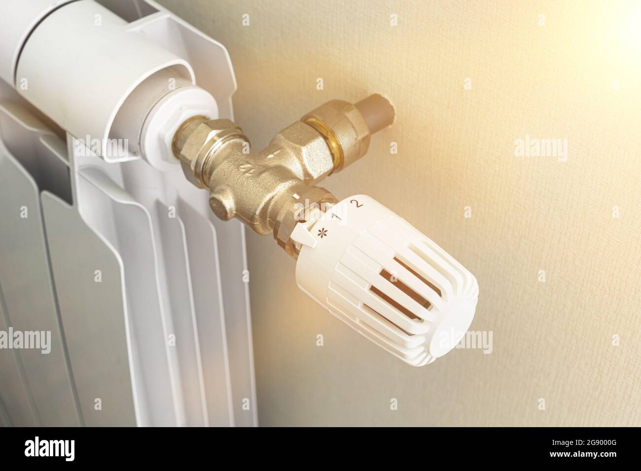 Engineering heating concept background with battery thermostat in the ...