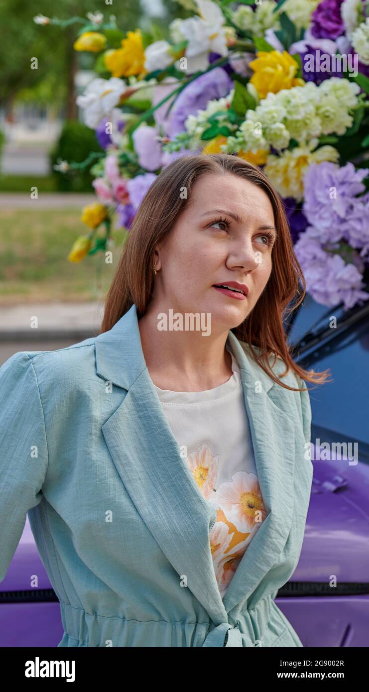 a girl and a colored car with different colors on the roof Stock Photo ...