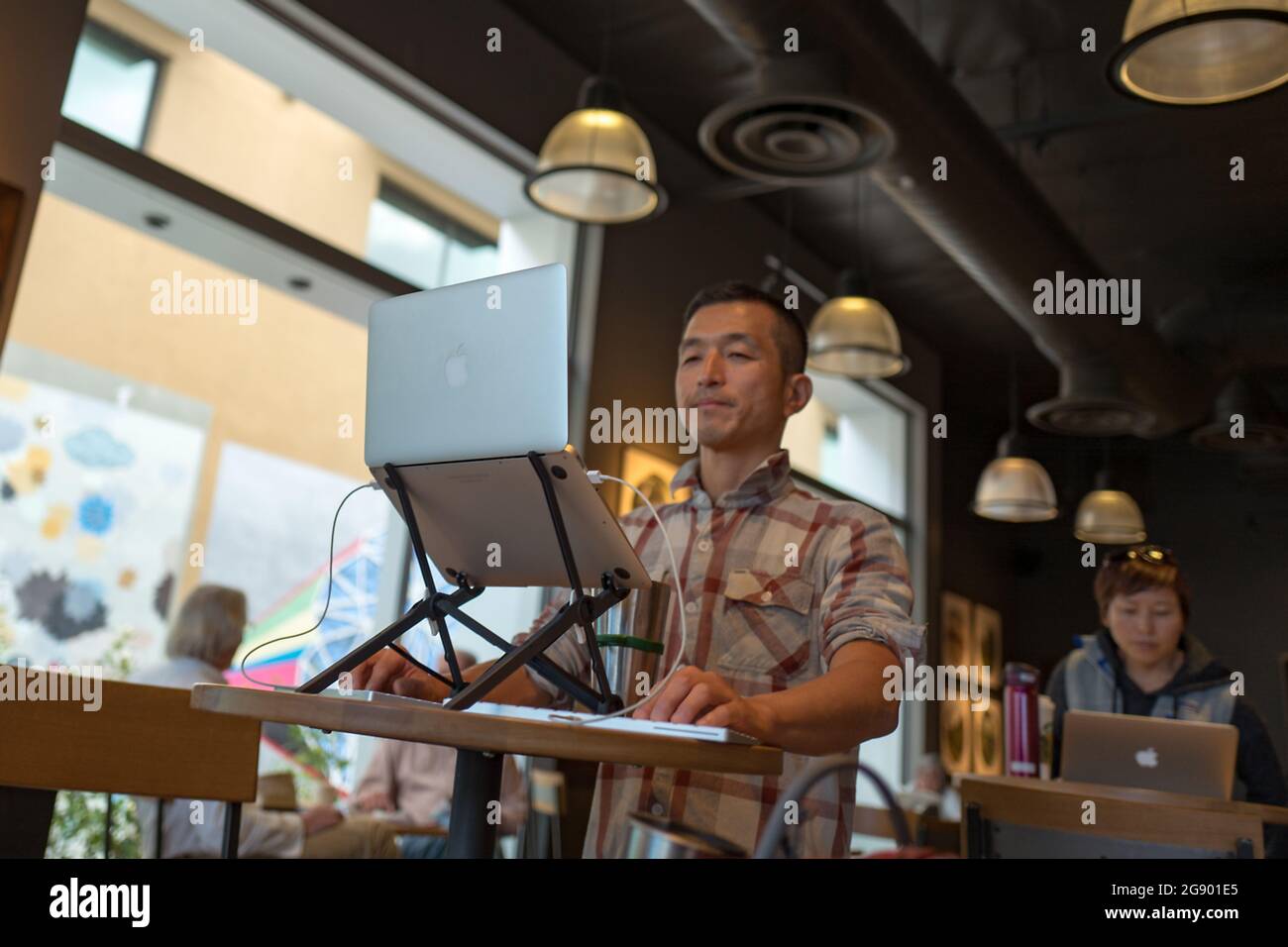 Inside a coffee shop in Silicon Valley, Palo Alto, California, a man ...