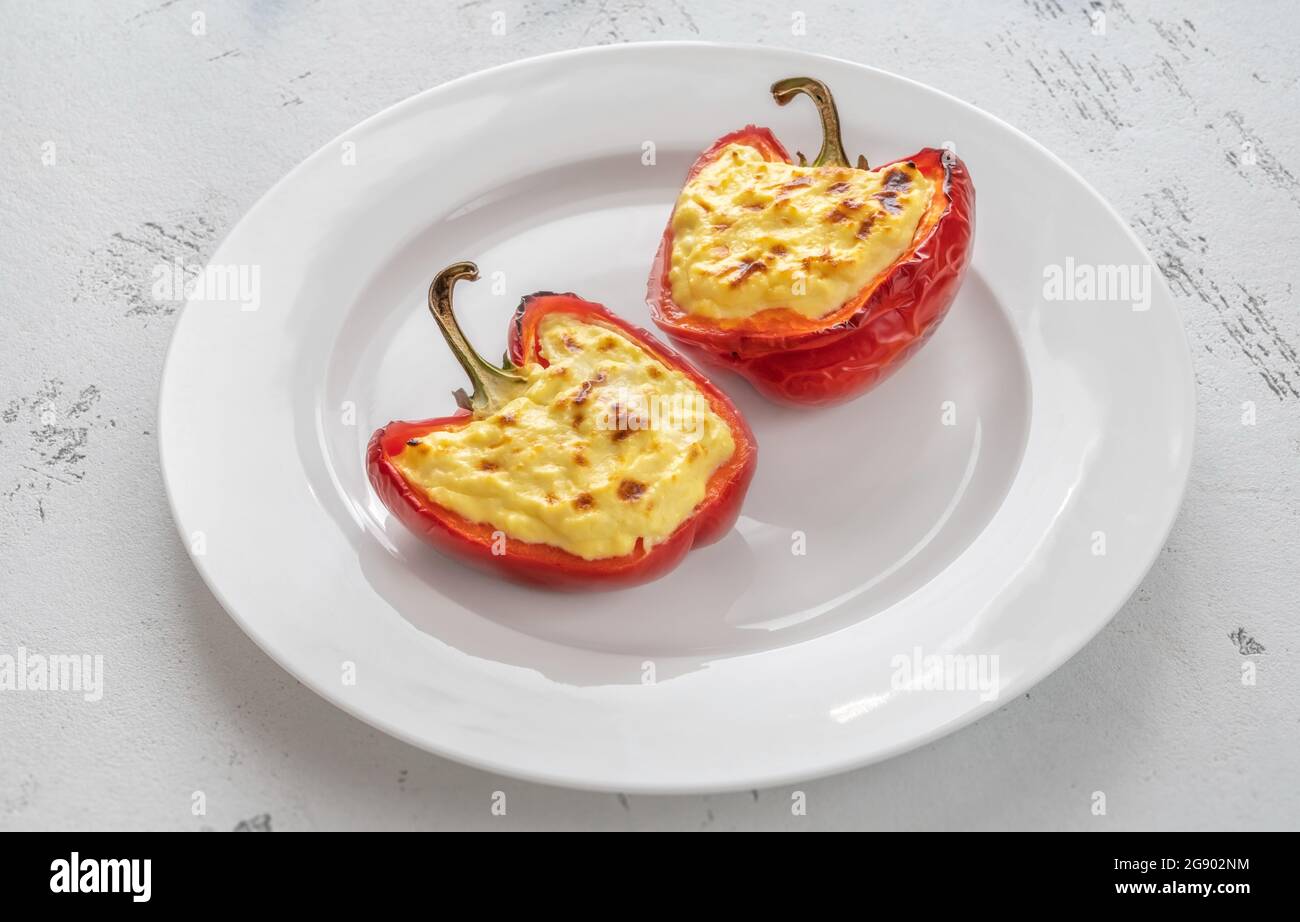 Bell pepper stuffed with ricotta and mozzarella cheese Stock Photo - Alamy