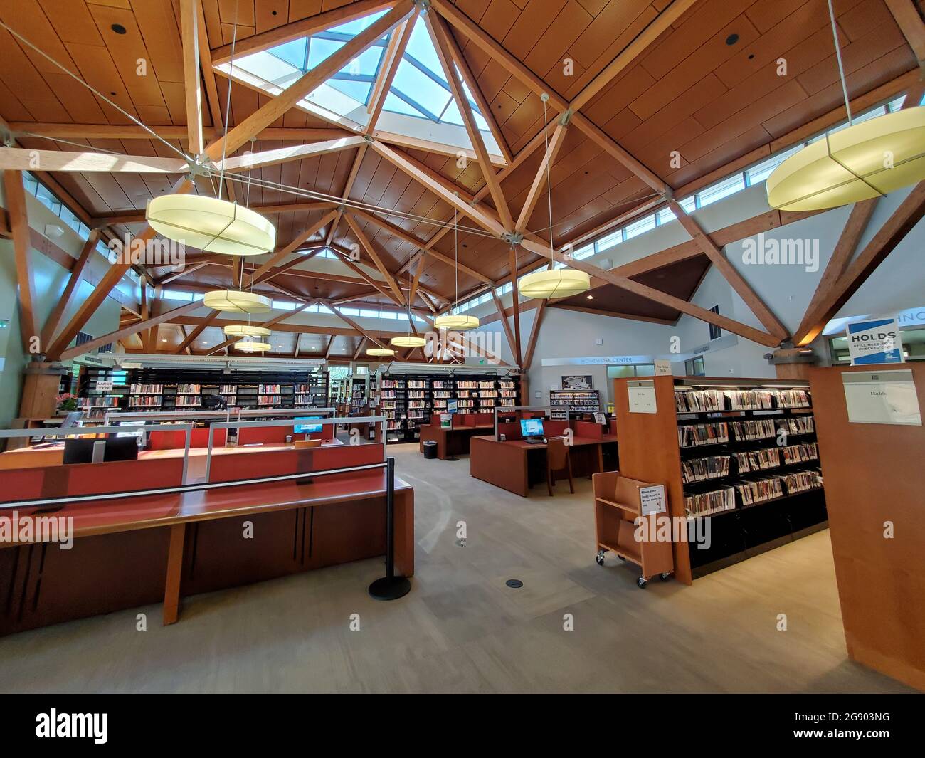 Stacks and shelves of books are visible at the Lafayette Public Library ...