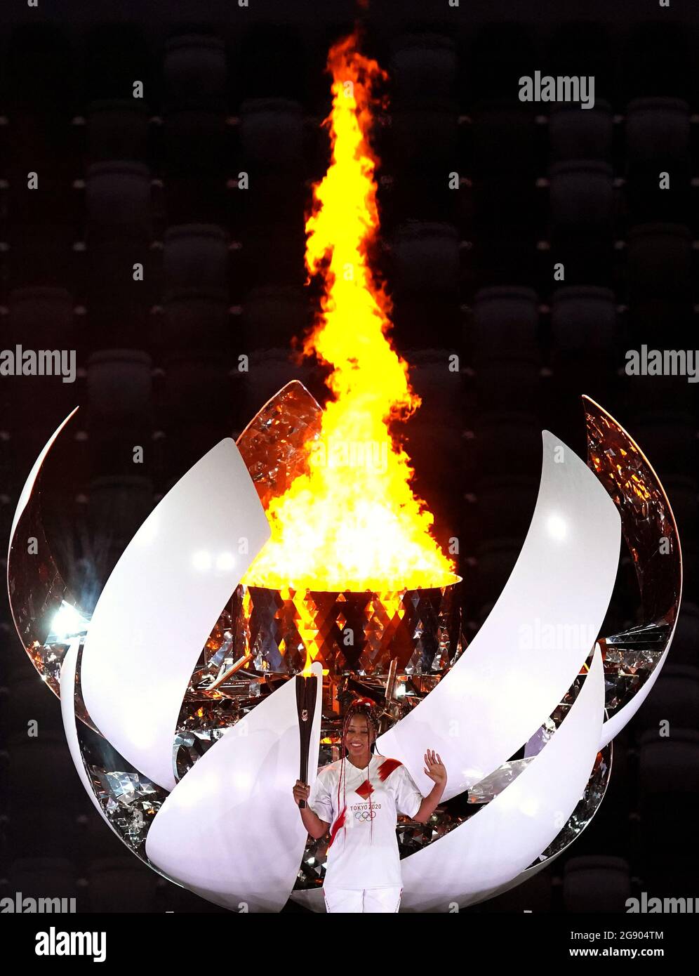 Japan's Naomi Osaka lights the Olympics Flame during the opening ...
