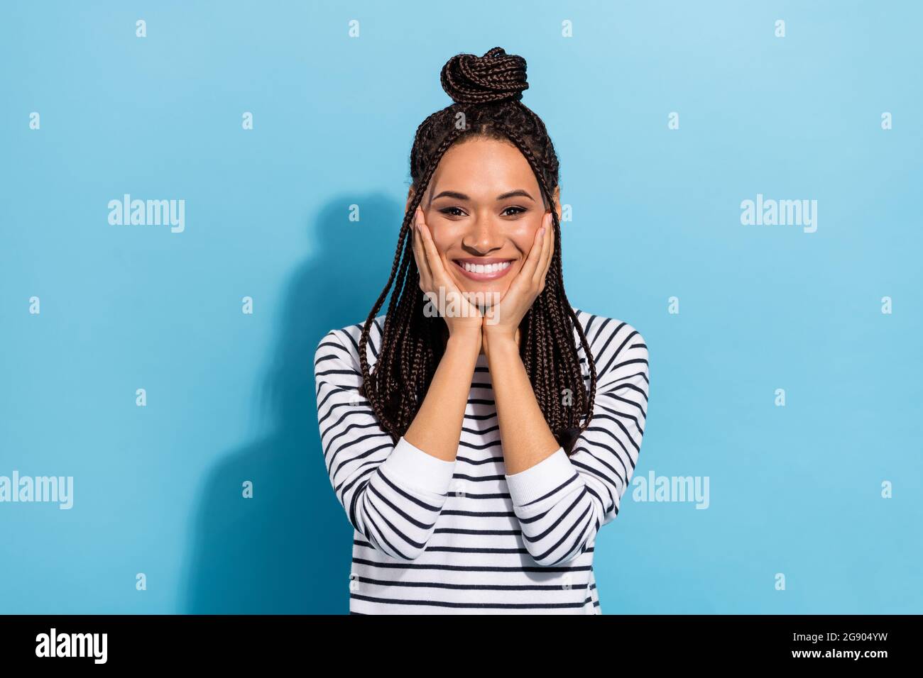 Photo portrait of girl with dreadlocks smiling touching cheeks cute ...