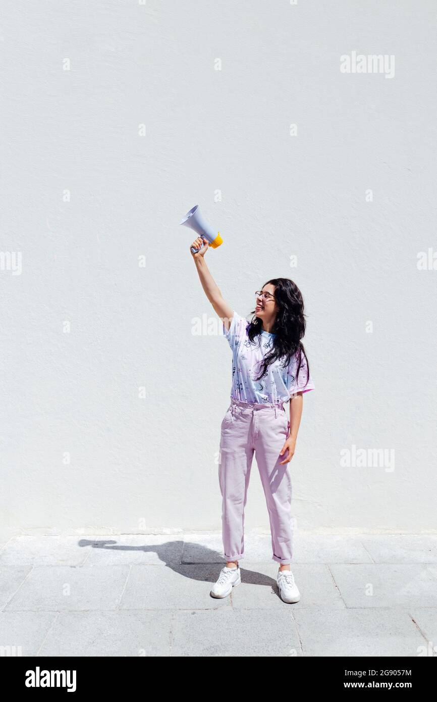 Hand holding megaphone power hi-res stock photography and images - Alamy