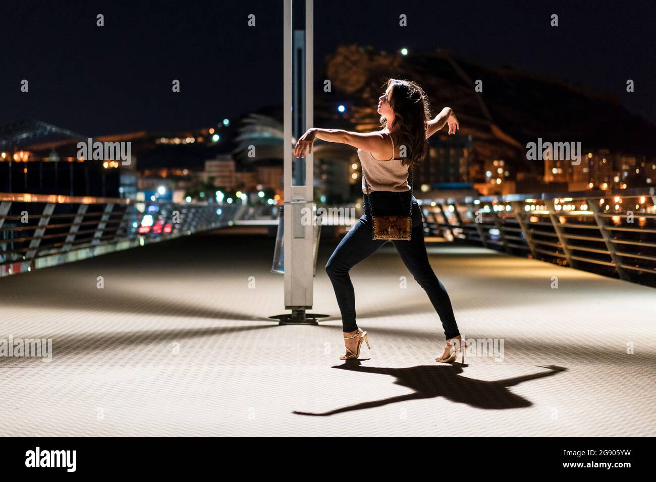 Woman on pier arms hi-res stock photography and images - Alamy