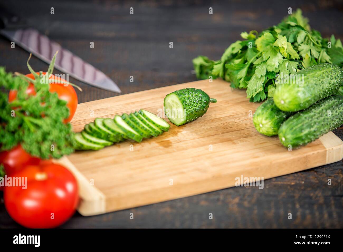 cutting vegetables for salad Stock Photo - Alamy