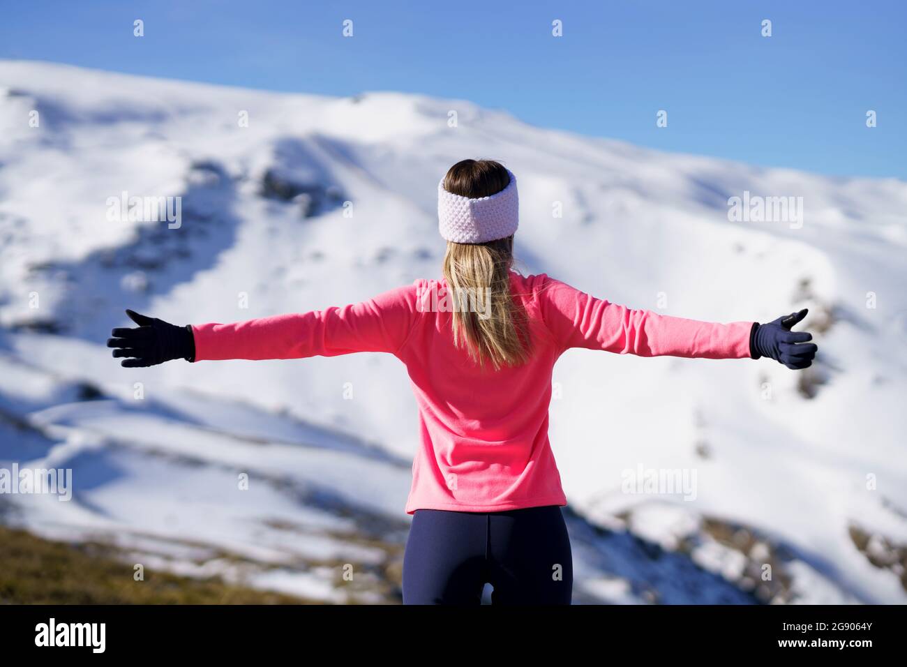 Female athlete standing arms hi-res stock photography and images - Alamy