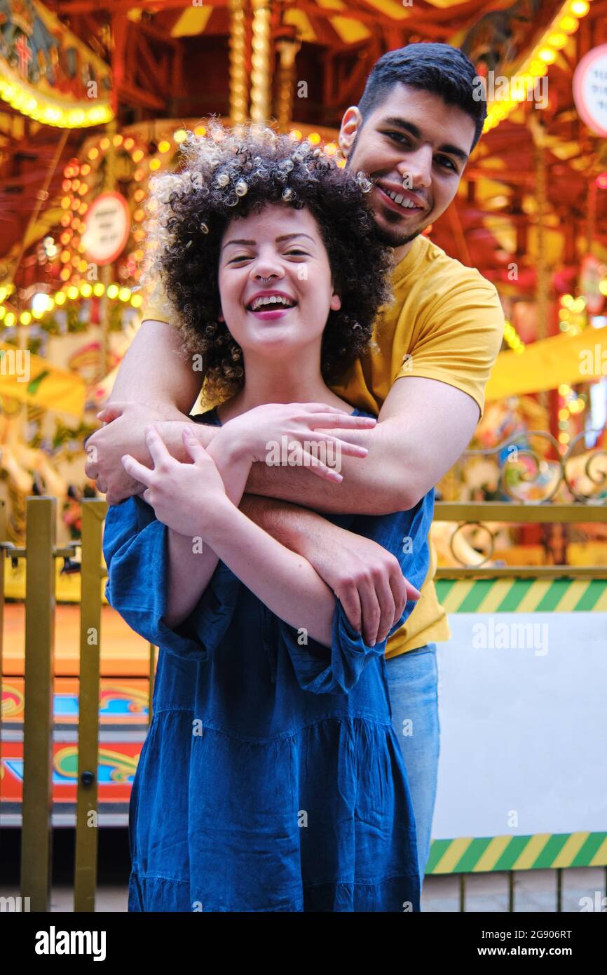 Cheerful young couple standing hi-res stock photography and images - Alamy