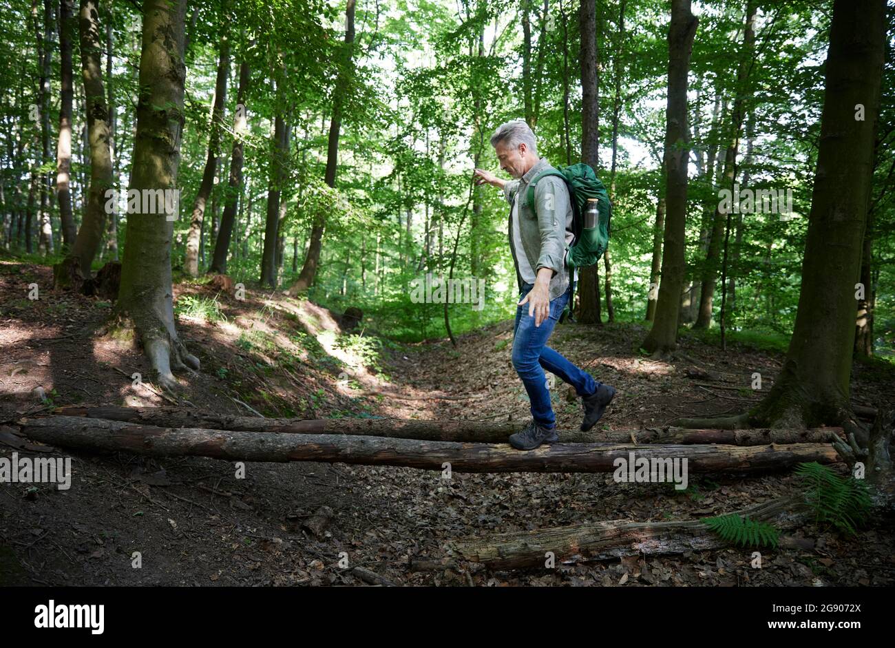 Man walking side view arms hi-res stock photography and images - Alamy
