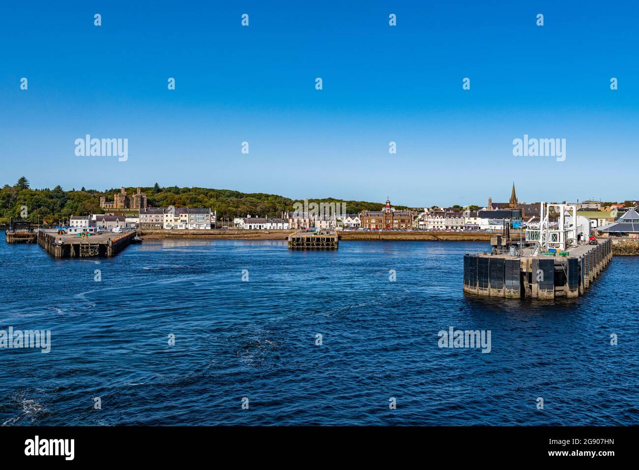 UK, Scotland, Stornoway, Clear blue sky over harbor of coastal town ...