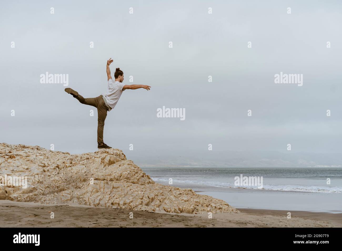 Young man dancing rock beach point reyes hi-res stock photography and ...