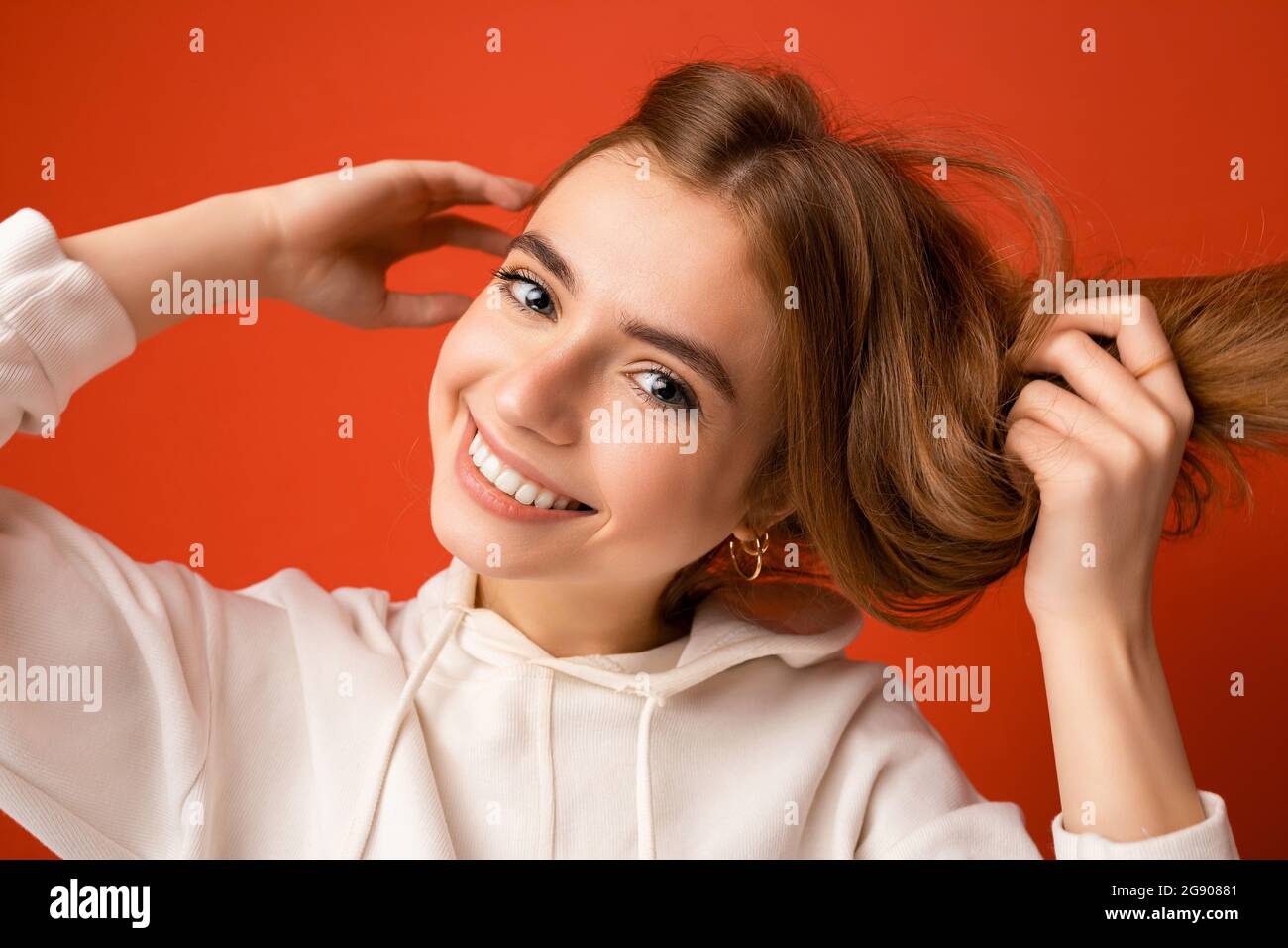 Photo of attractive cute happy emotional young woman poising isolated ... Photo of attractive cute happy emotional young woman poising isolated ...