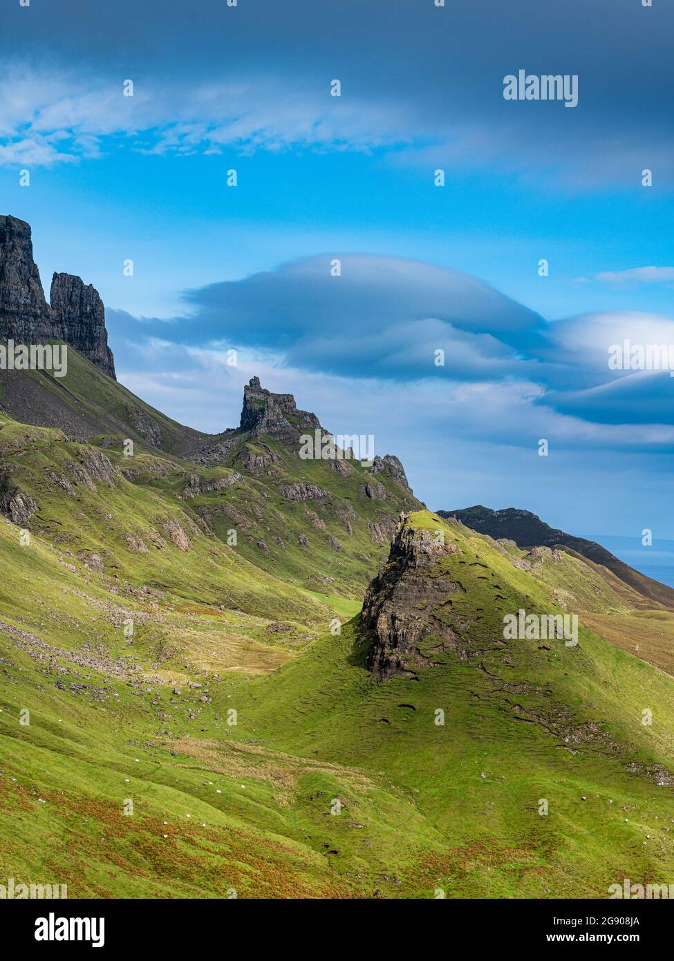 UK, Scotland, Clouds over mountain ridge in Quiraing landslide Stock ...