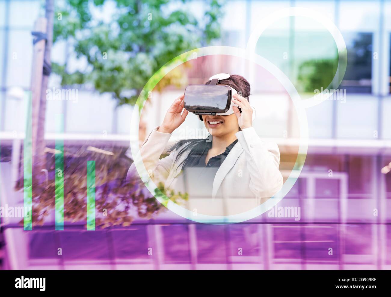 Female professional using virtual reality headset Stock Photo - Alamy