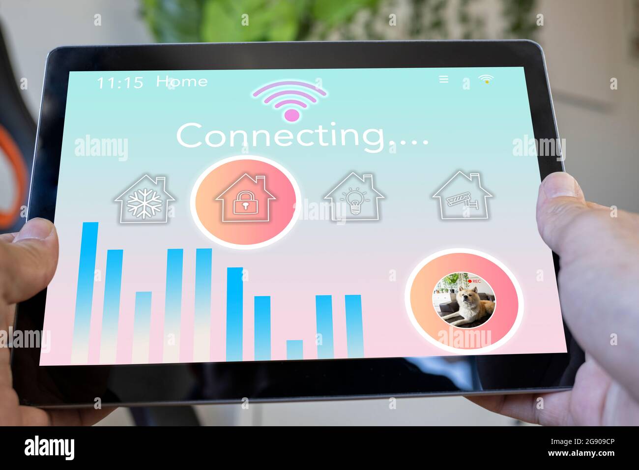 Futuristic smart home tablet on wooden table Stock Photo - Alamy