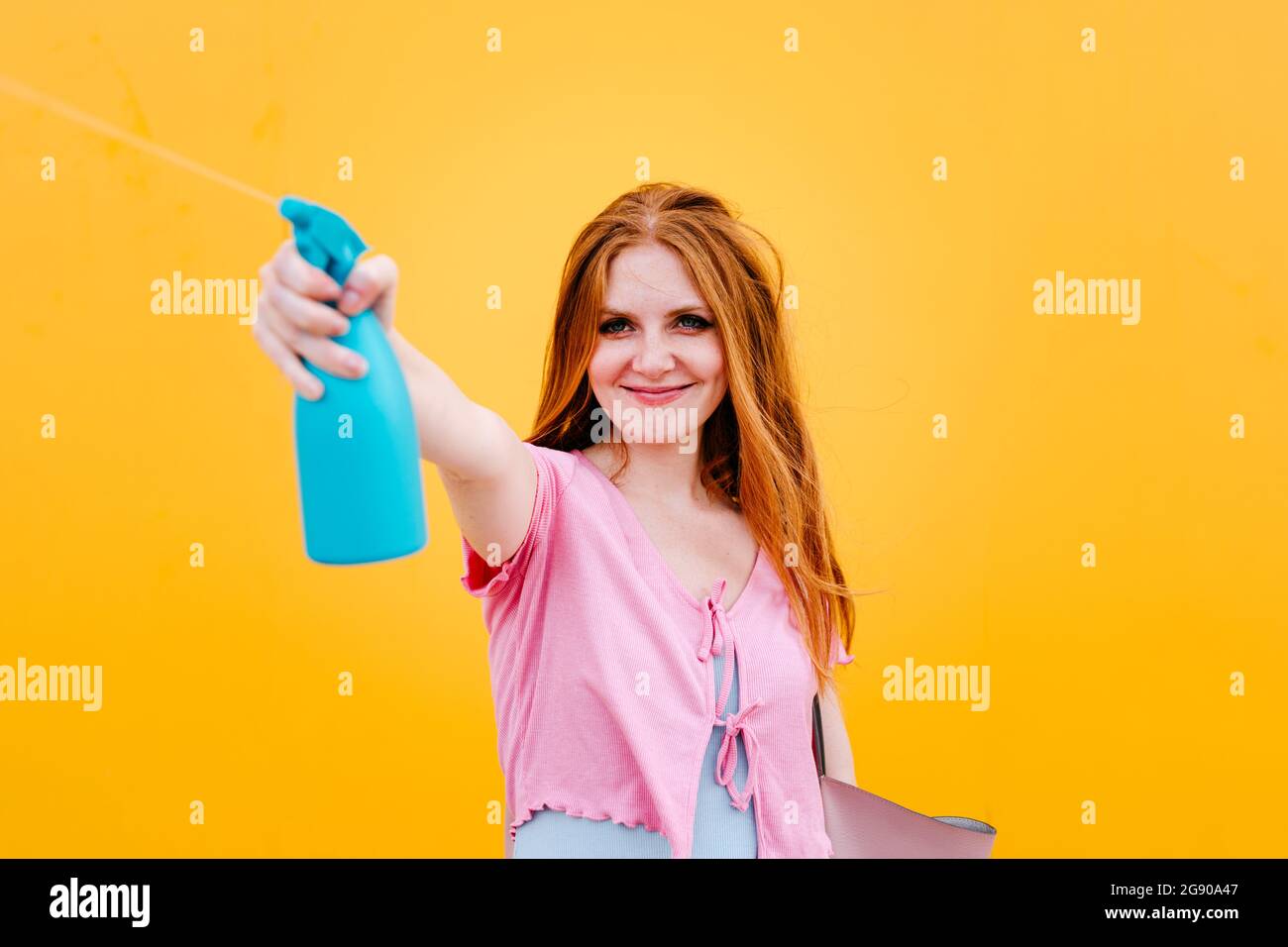 Beautiful young woman spray hi-res stock photography and images - Alamy
