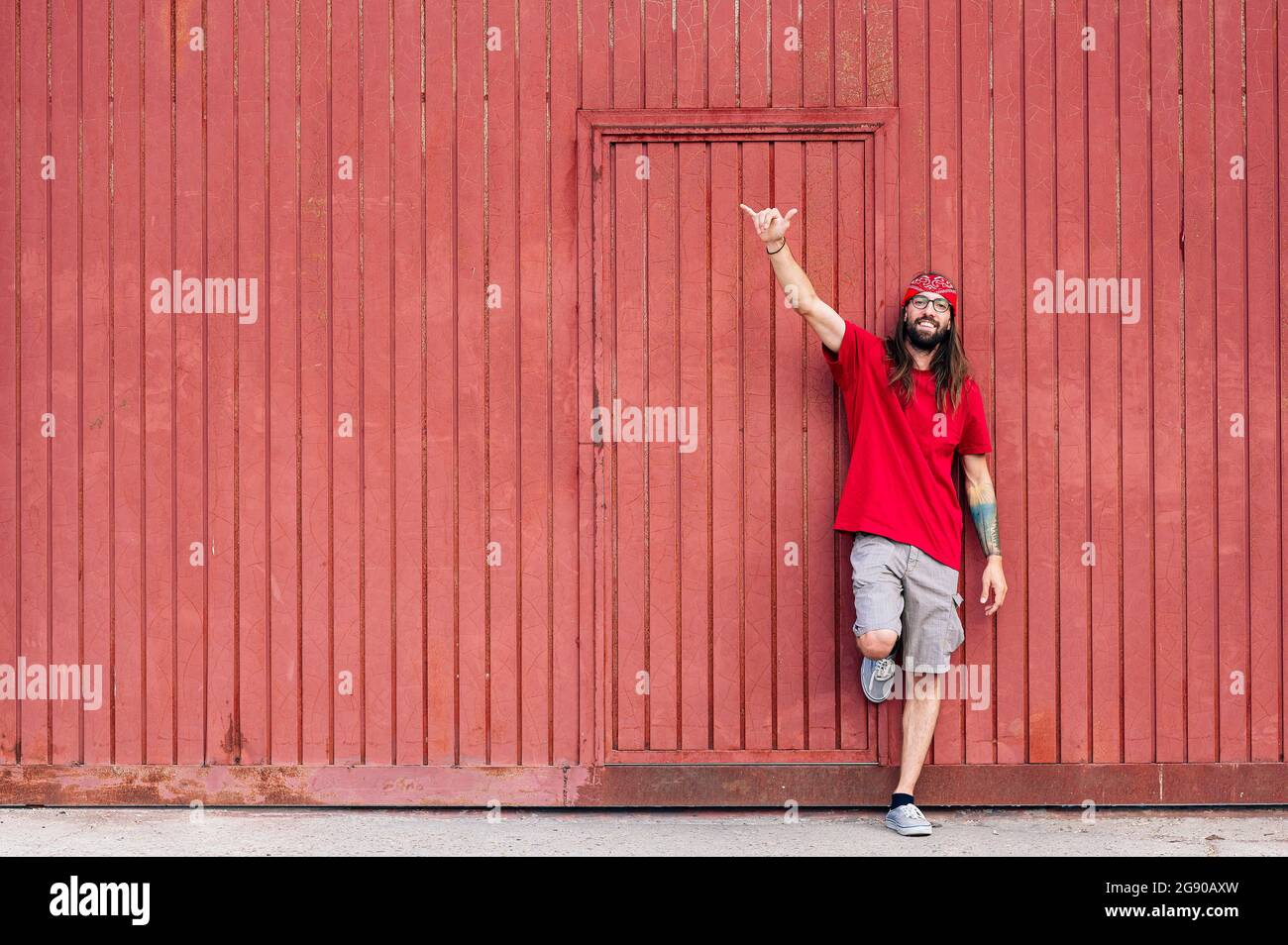 Man smiling making shaka gesture hi-res stock photography and images ...