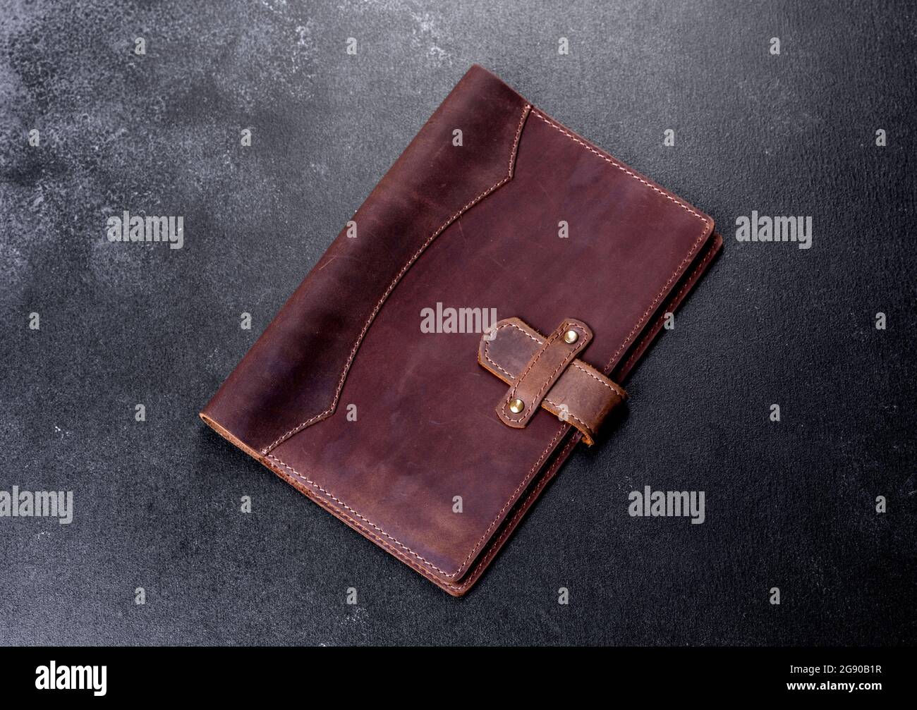 Beautiful leather brown case made of leather designed for wrapping a ...