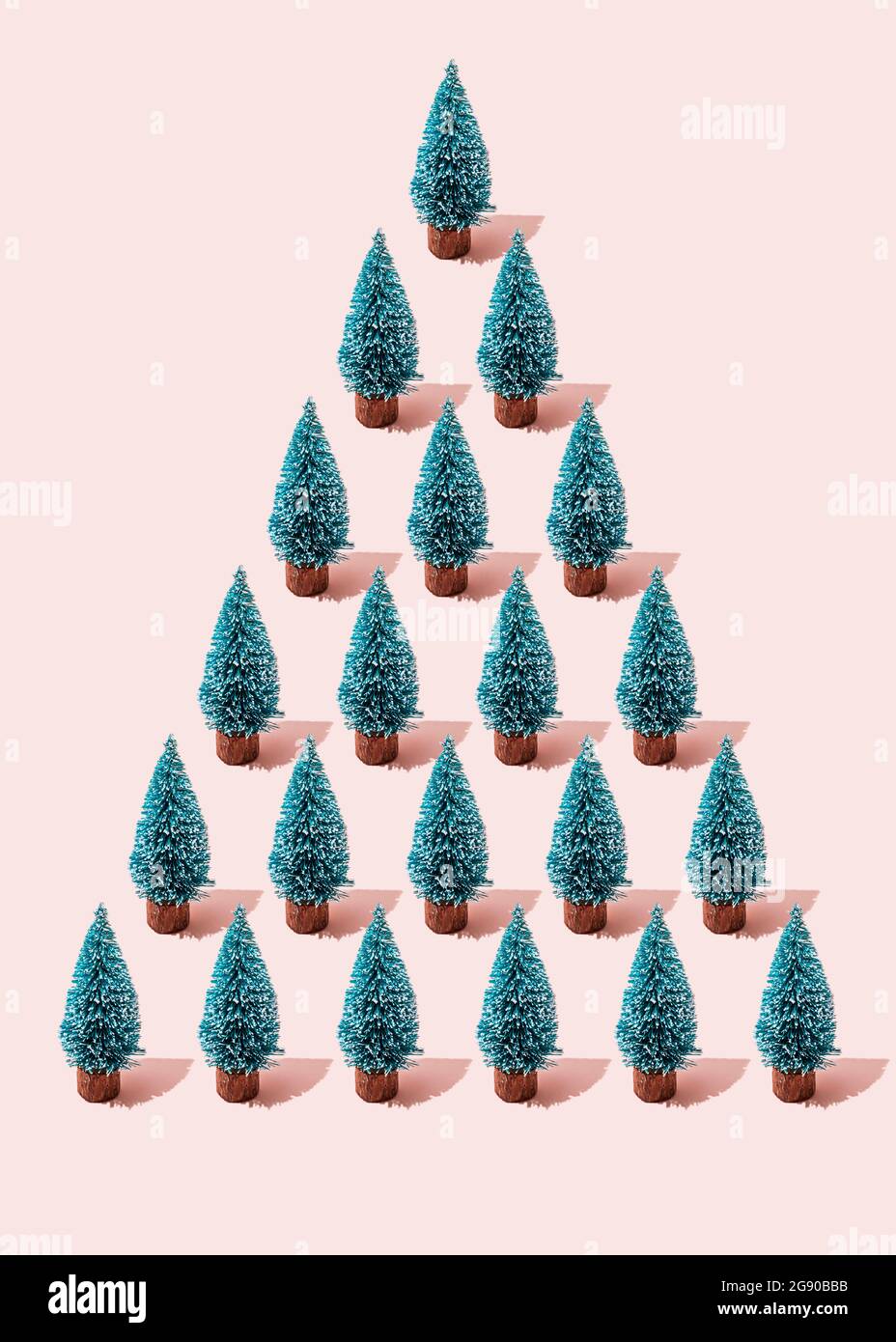 Studio shot of coniferous trees arranged into triangle shape Stock ...