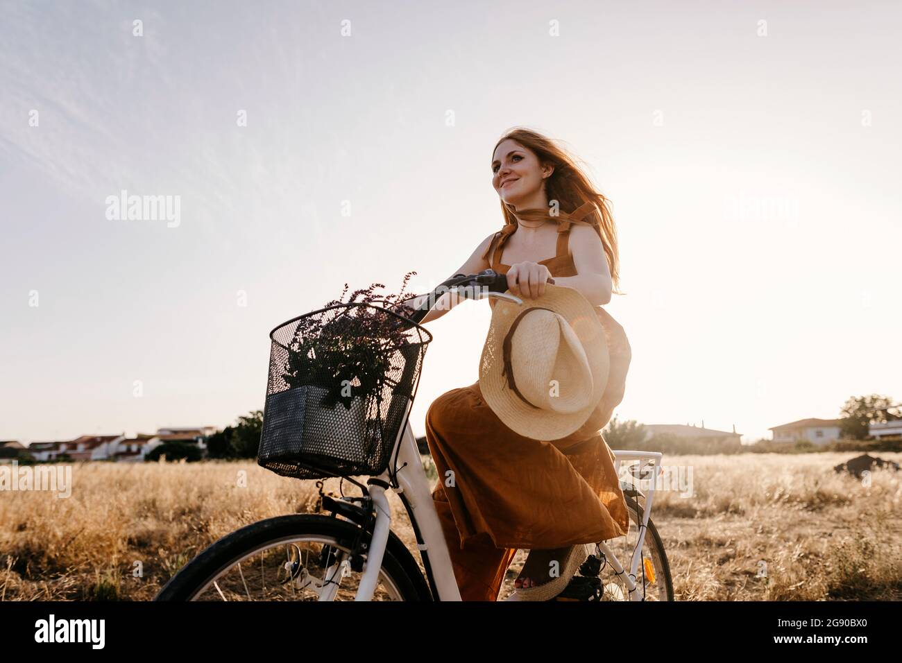 Beautiful redhead on bike hi-res stock photography and images - Alamy