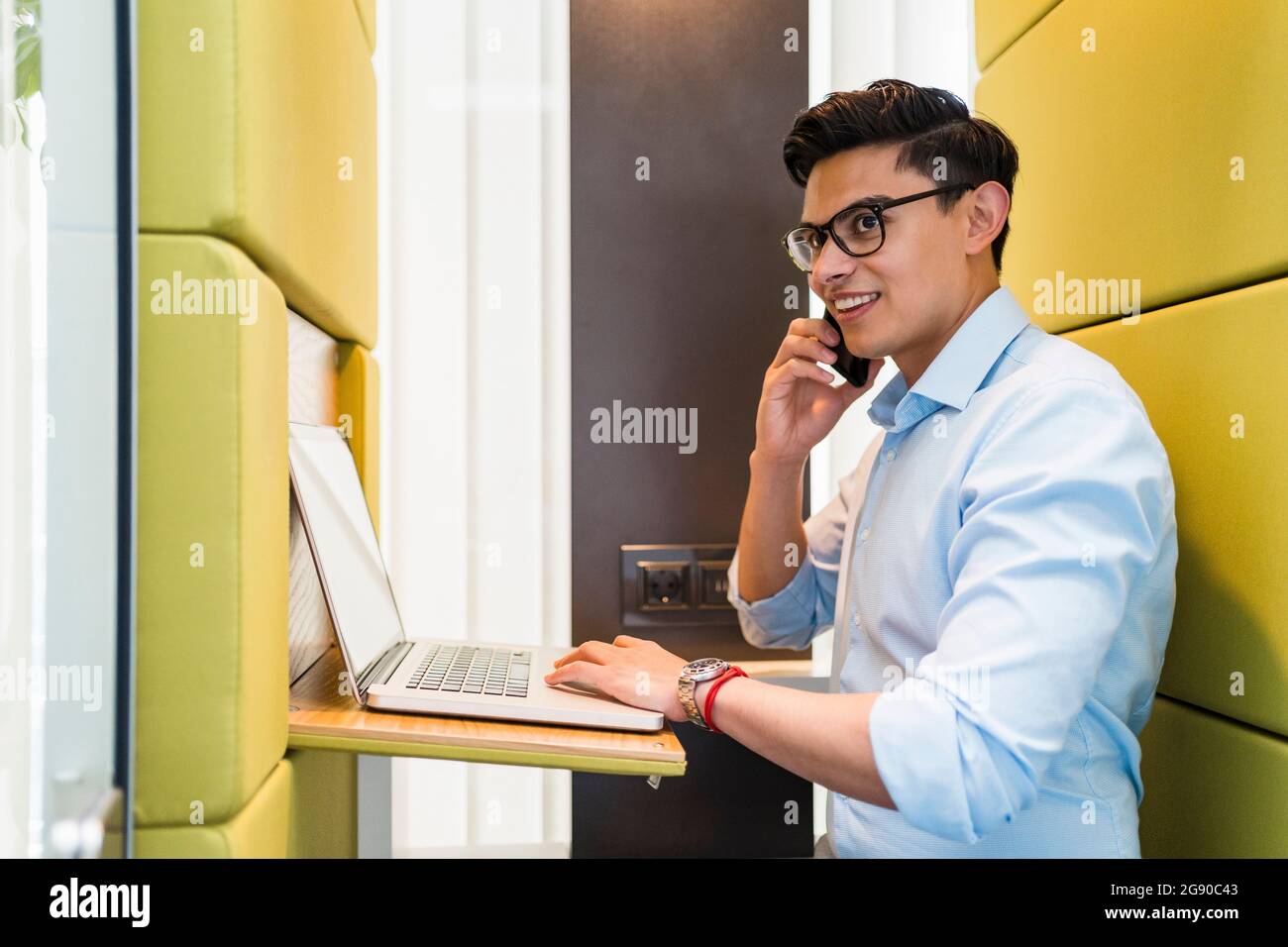 Sitting on phone booth hi-res stock photography and images - Alamy