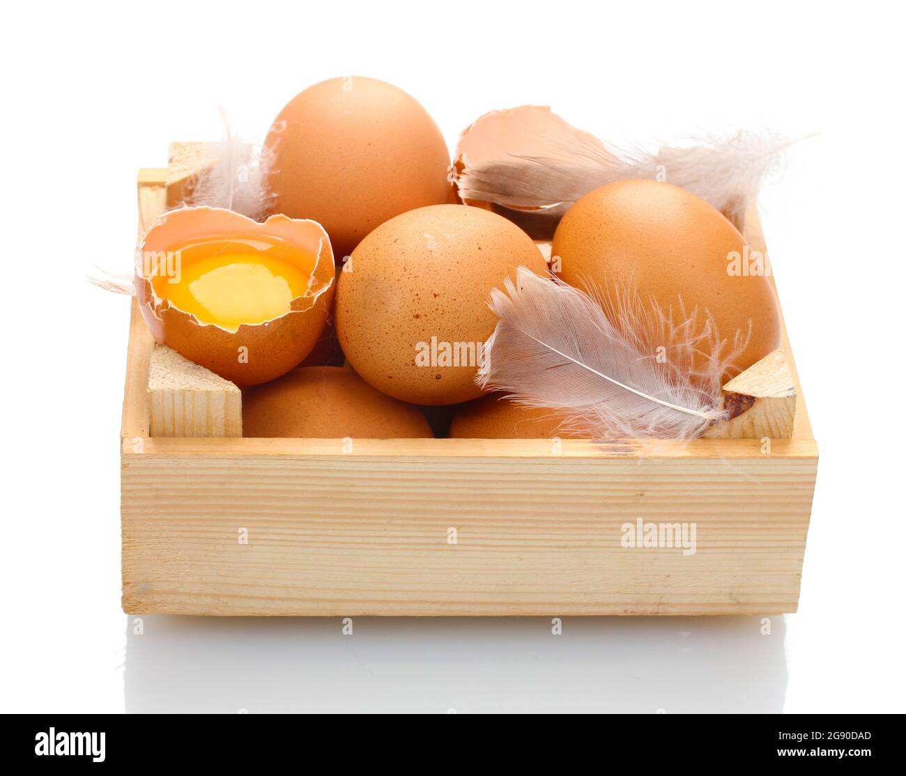 chicken eggs in wooden box isolated on white Stock Photo - Alamy