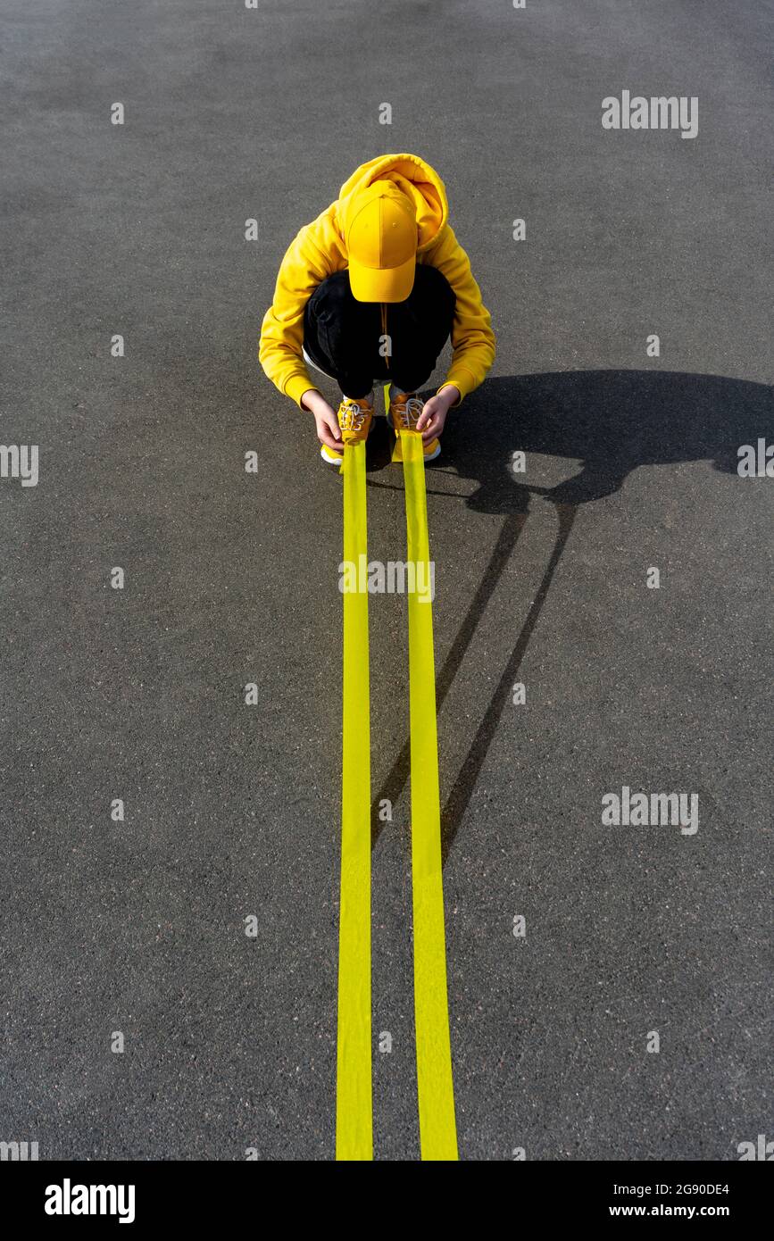 Yellow line on road stripes hi-res stock photography and images - Alamy