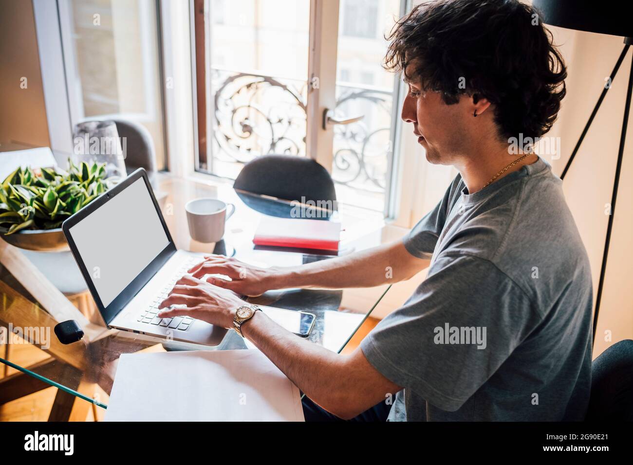 Man working laptop from home hi-res stock photography and images - Alamy