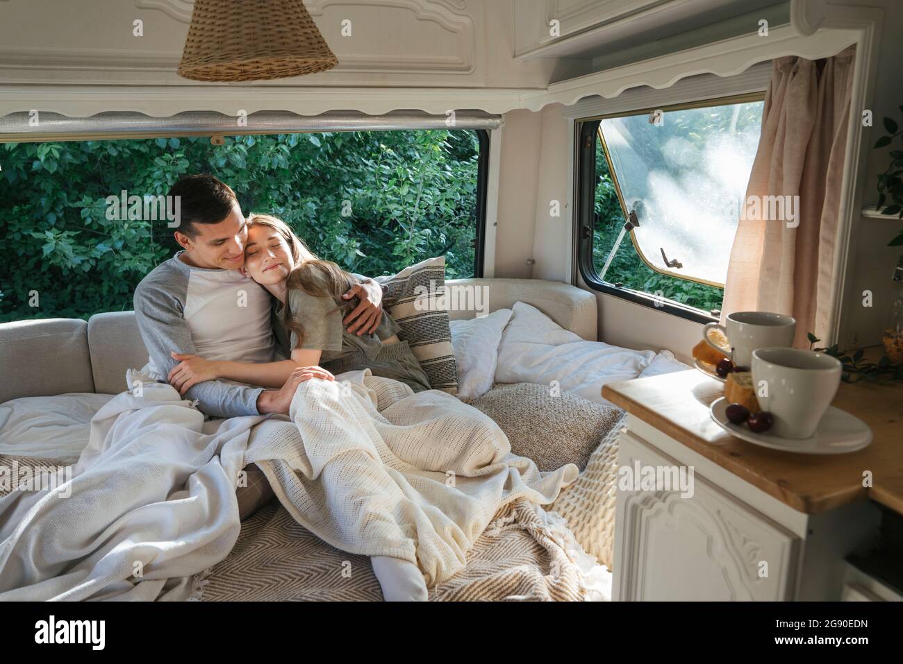 Adult sitting around table hi-res stock photography and images - Alamy