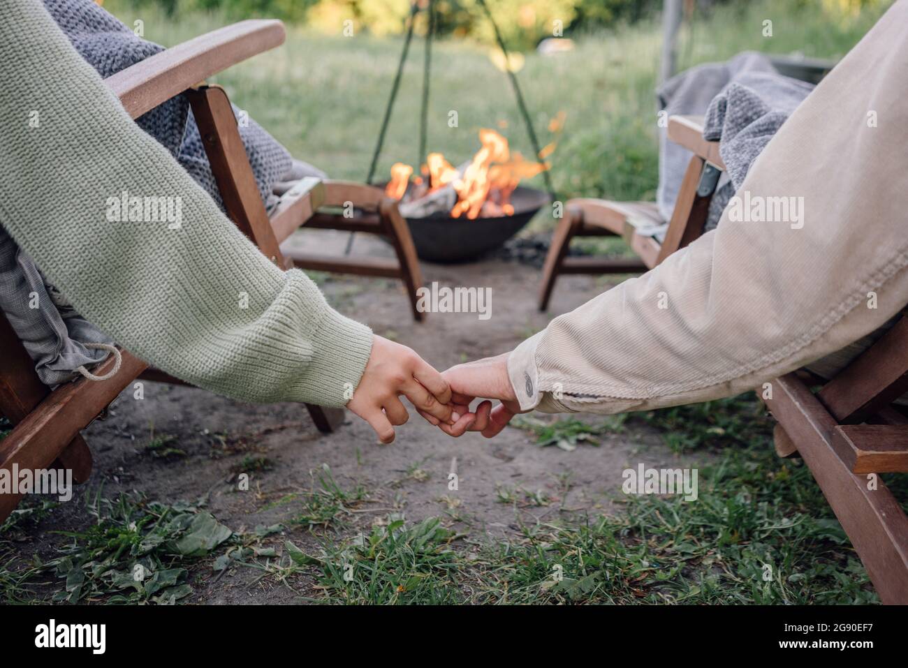 Catching Fire Holding Hands