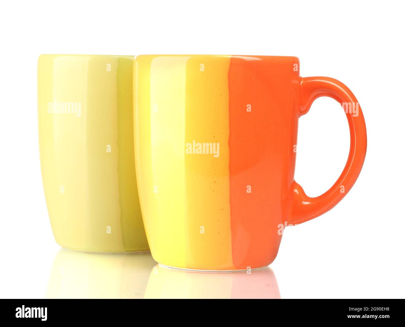 Two color cups isolated on white Stock Photo - Alamy