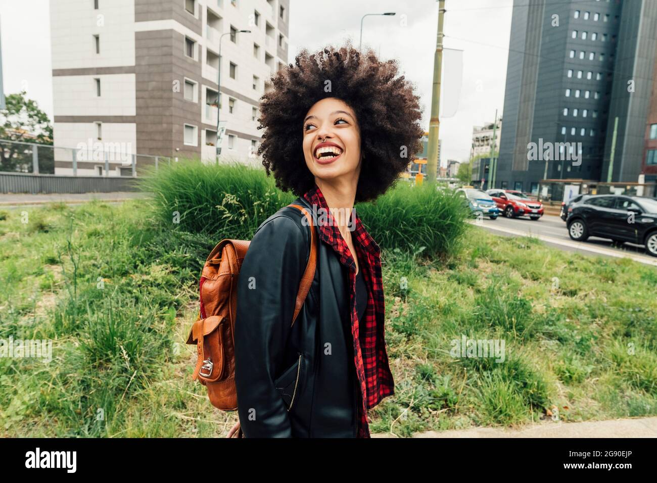 Back view of woman with backpack in the city hi-res stock photography ...