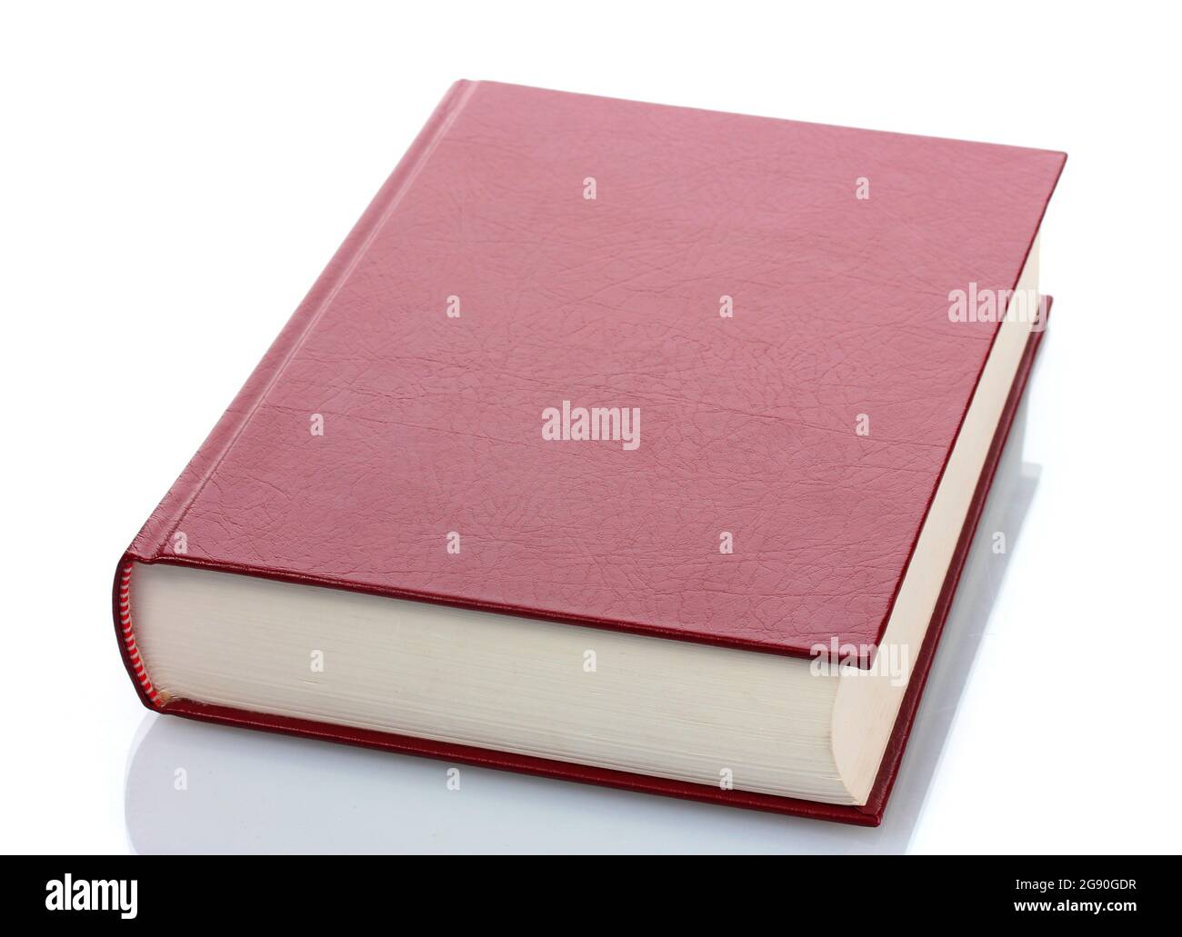 Big red book isolated on white Stock Photo - Alamy