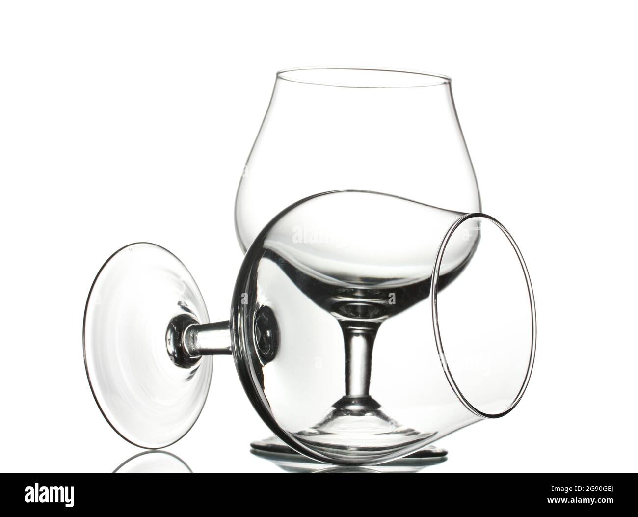 Two empty glasses isolated on white Stock Photo - Alamy