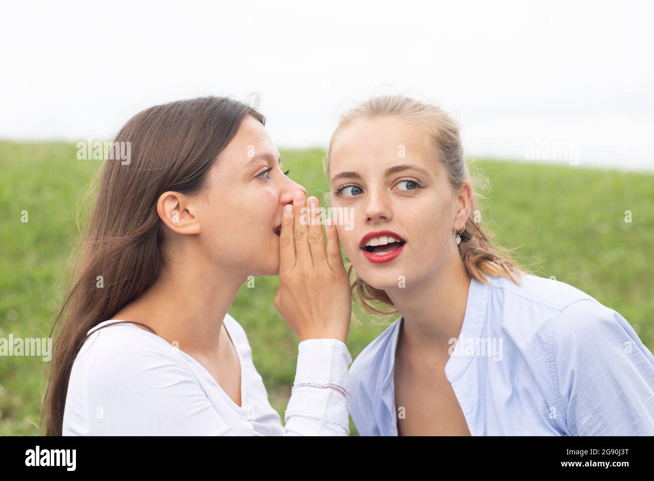 Gossiping hi-res stock photography and images - Alamy