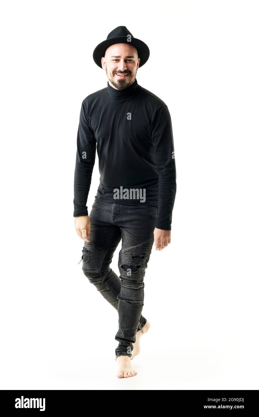 Happy edgy offbeat style young artist man in black clothes smiling ...