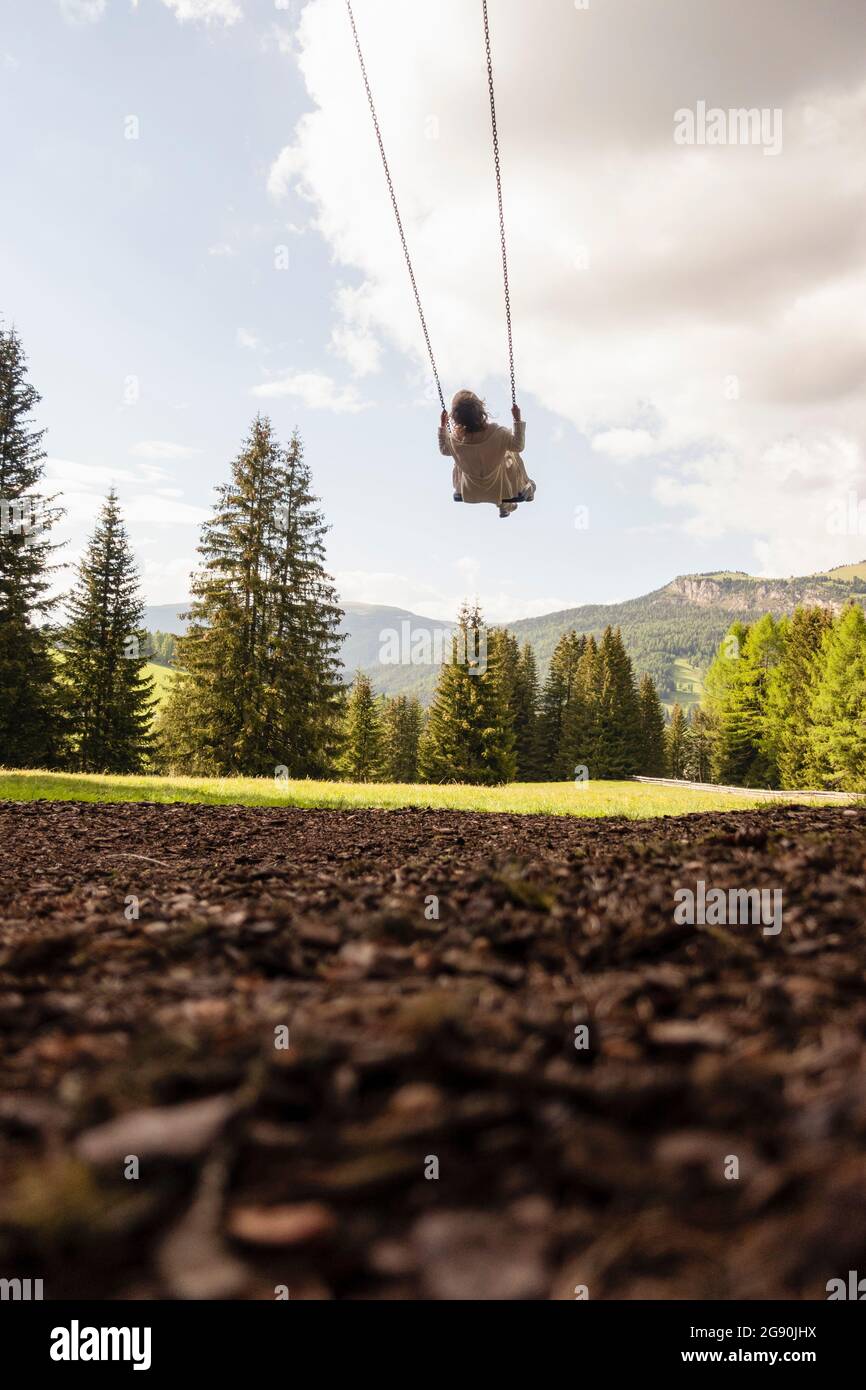 Girl on swing rope hi-res stock photography and images - Alamy