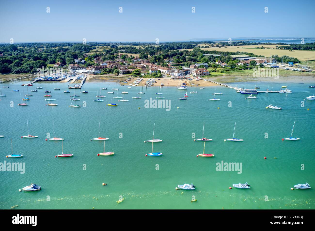 Itchenor West Sussex with sailing boats moored in the estuary and on ...