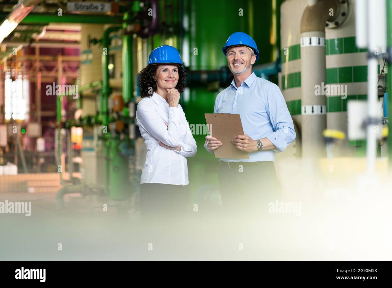 Portrait happy female engineer hi-res stock photography and images - Alamy
