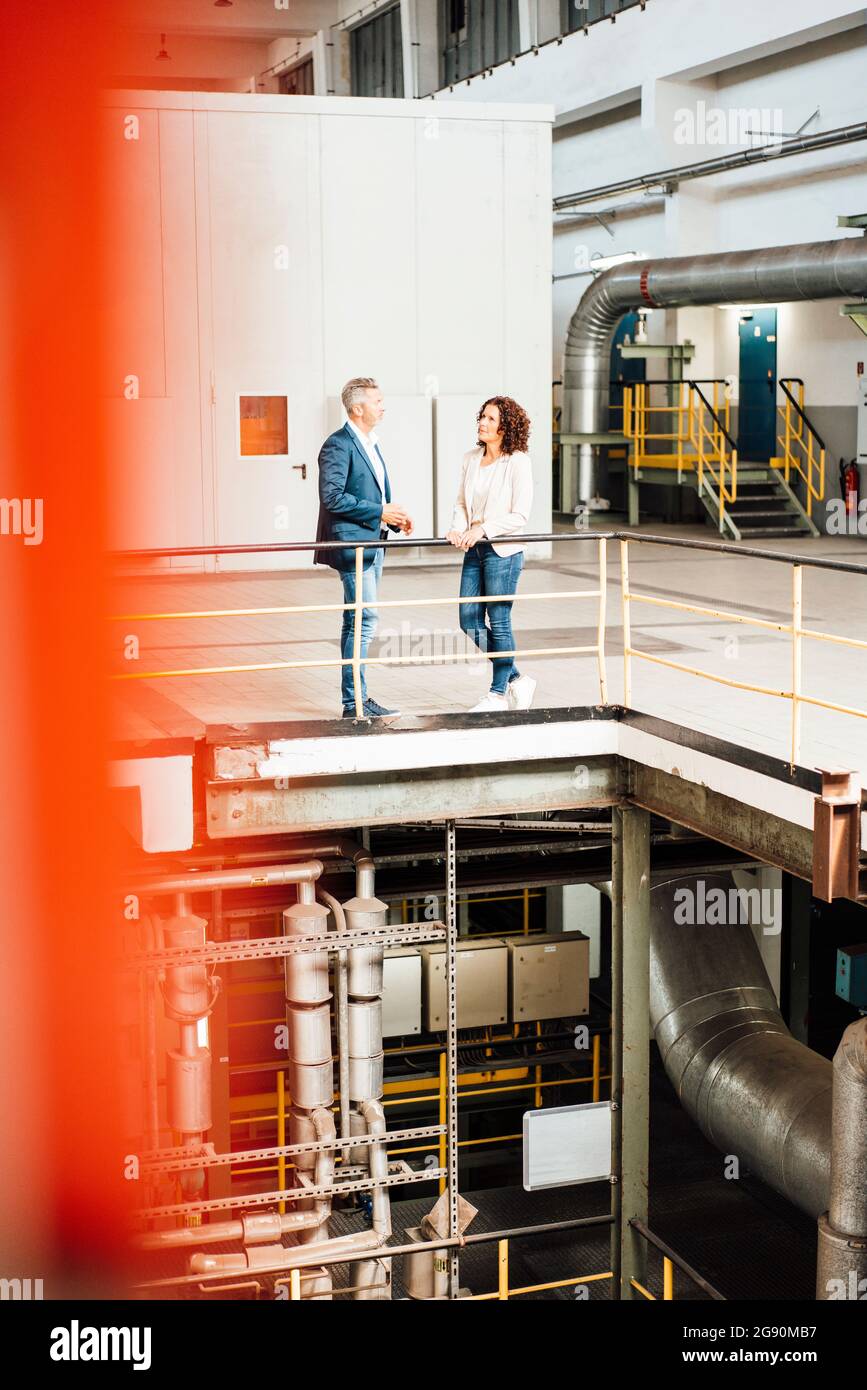 Standing talking communication discussion planning hi-res stock ...