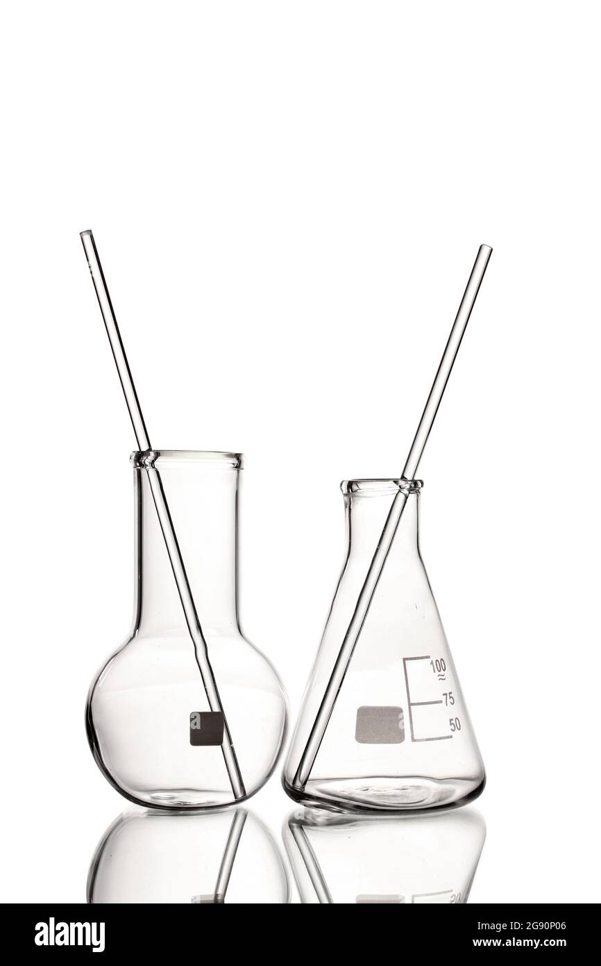 Two empty flasks with reflection isolated on white Stock Photo - Alamy