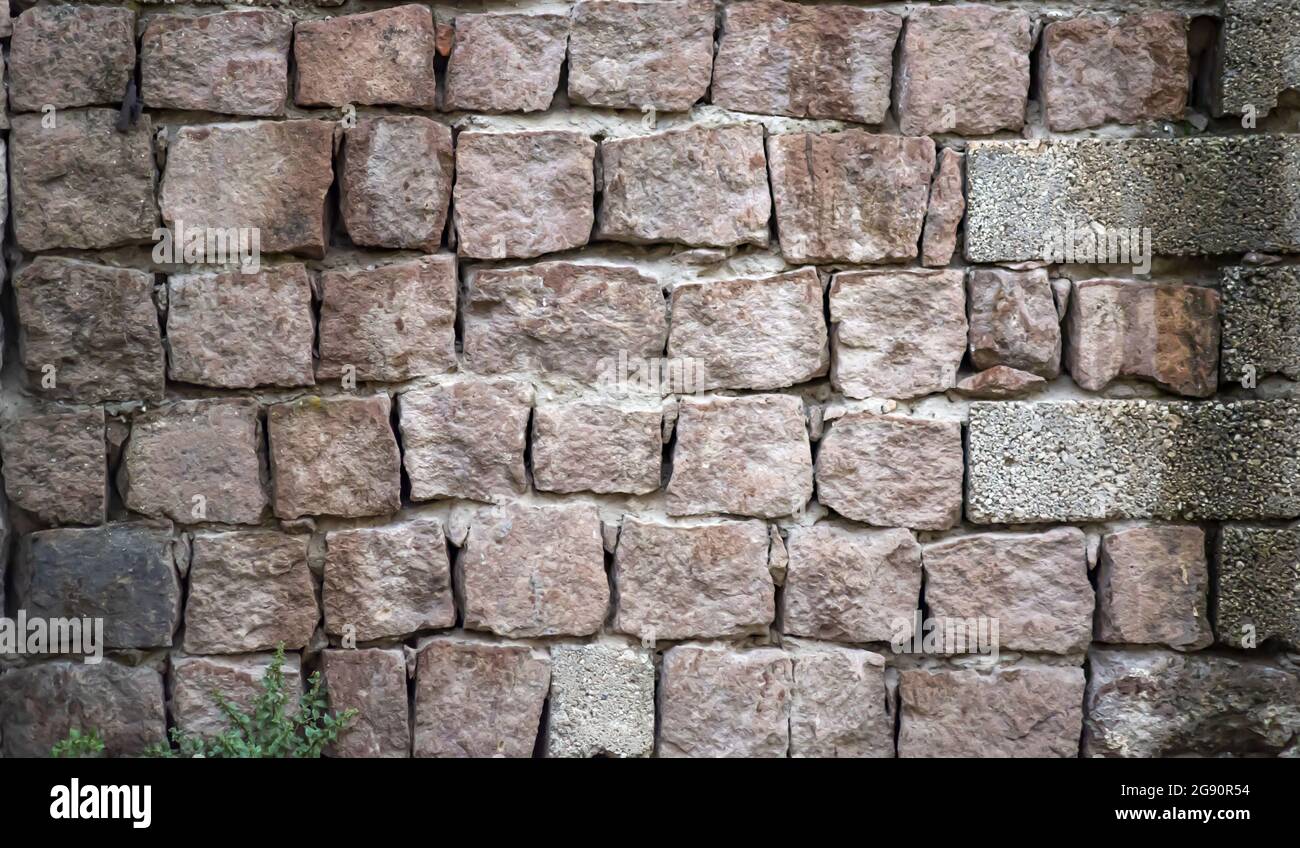 Closeup of stone wall surface made of cut stones Stock Photo - Alamy