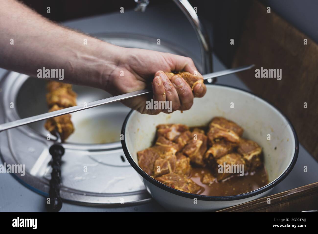 Male cooking arm hi-res stock photography and images - Alamy