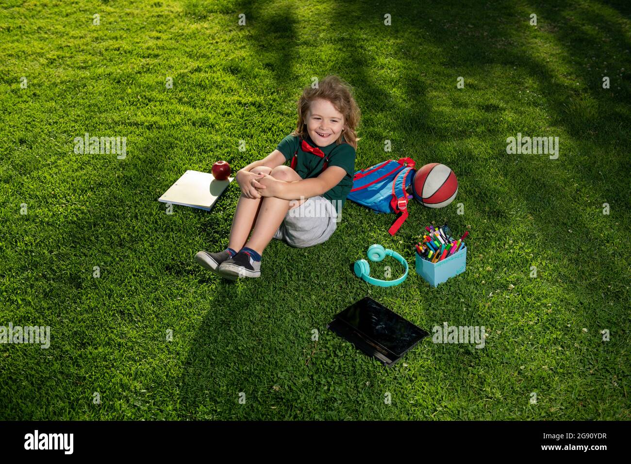 Kid outdoor education. Child doing homework outdoor Stock Photo - Alamy