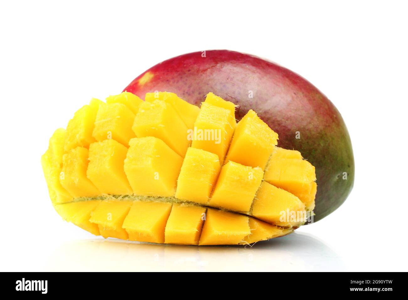 Fresh mango isolated on white Stock Photo - Alamy