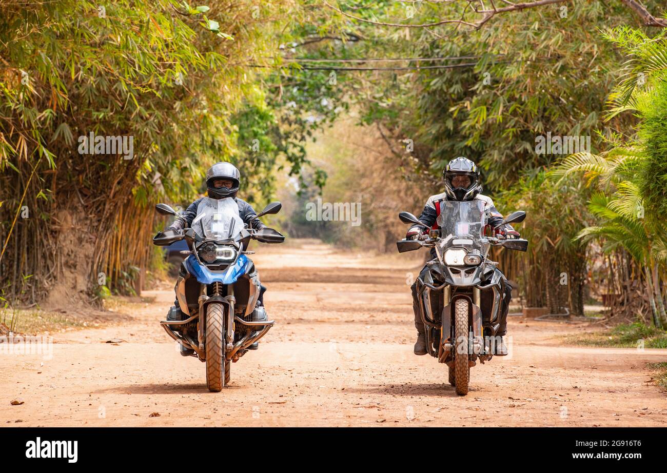 Two men riding motorcycle hi-res stock photography and images - Alamy