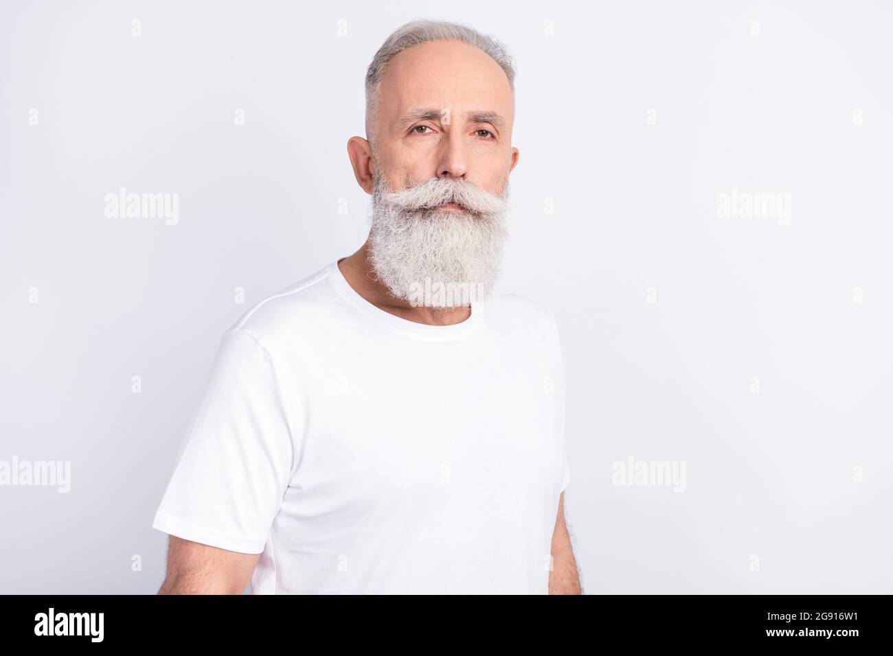 Photo of serious calm grandfather wear white t-shirt peaceful mood ...