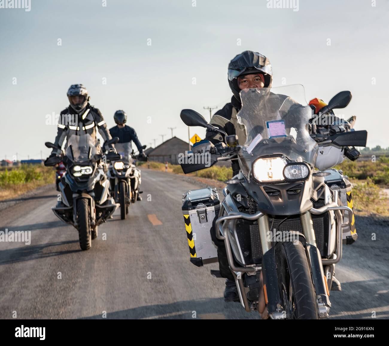 friends riding their adventure motorbikes in Cambodia Stock Photo - Alamy